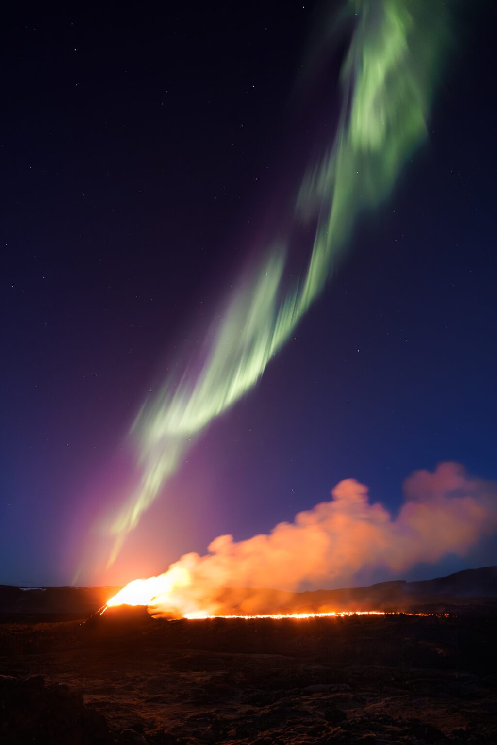 Photographing the Aurora Borealis Above an Eruption (Again)