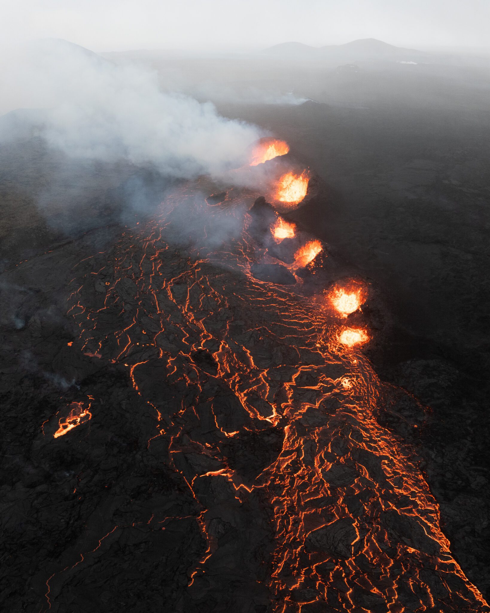Photographing the Aurora Borealis Above an Eruption (Again)